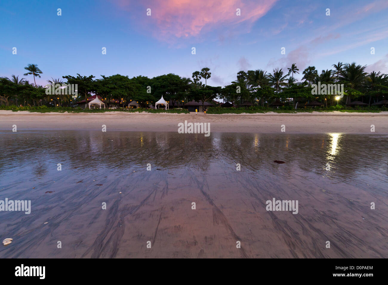 Sunset on the Beach of Jimbaran on Bali, Indonesia Stock Photo - Alamy