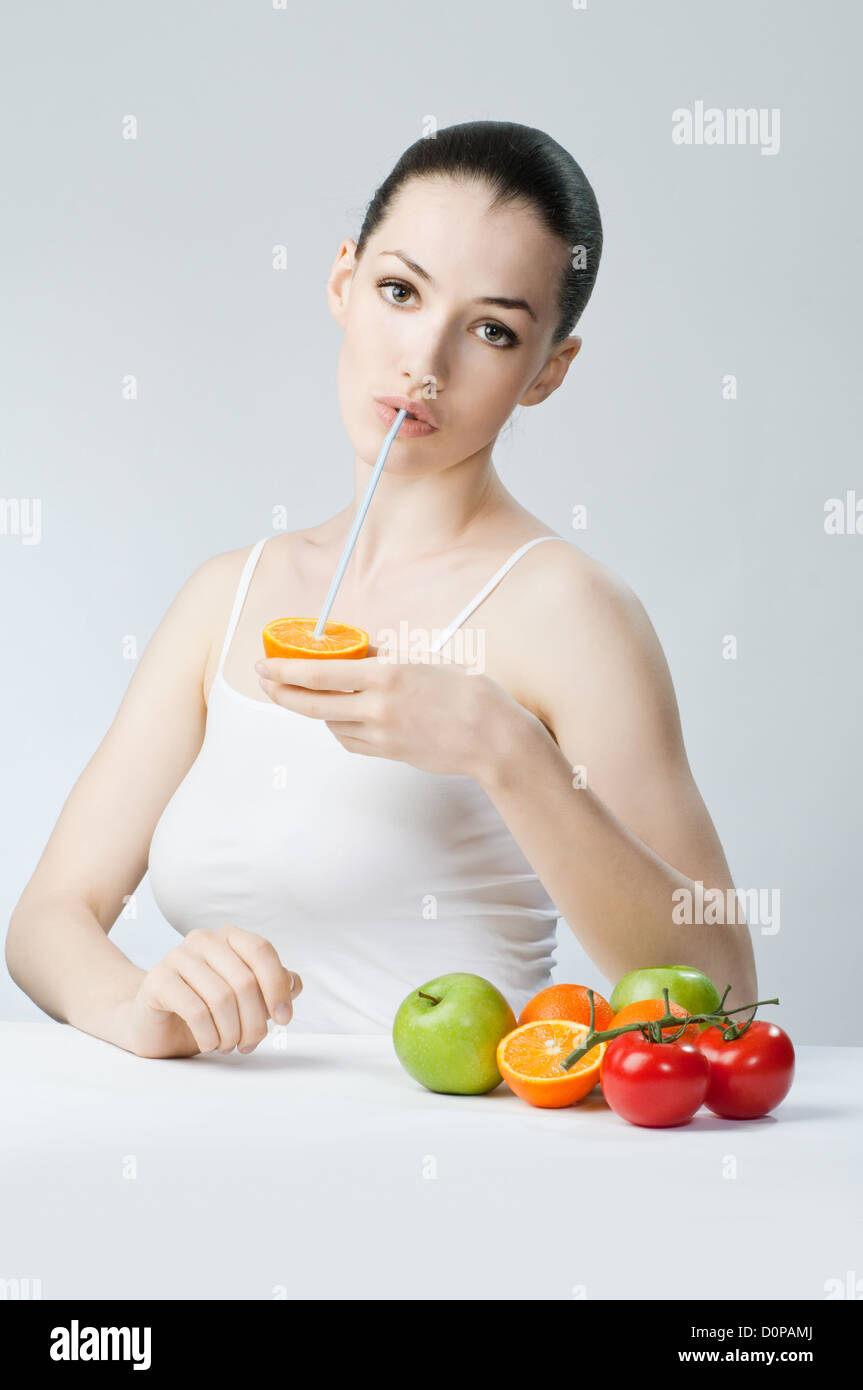 A beautiful slender girl eating healthy food Stock Photo - Alamy
