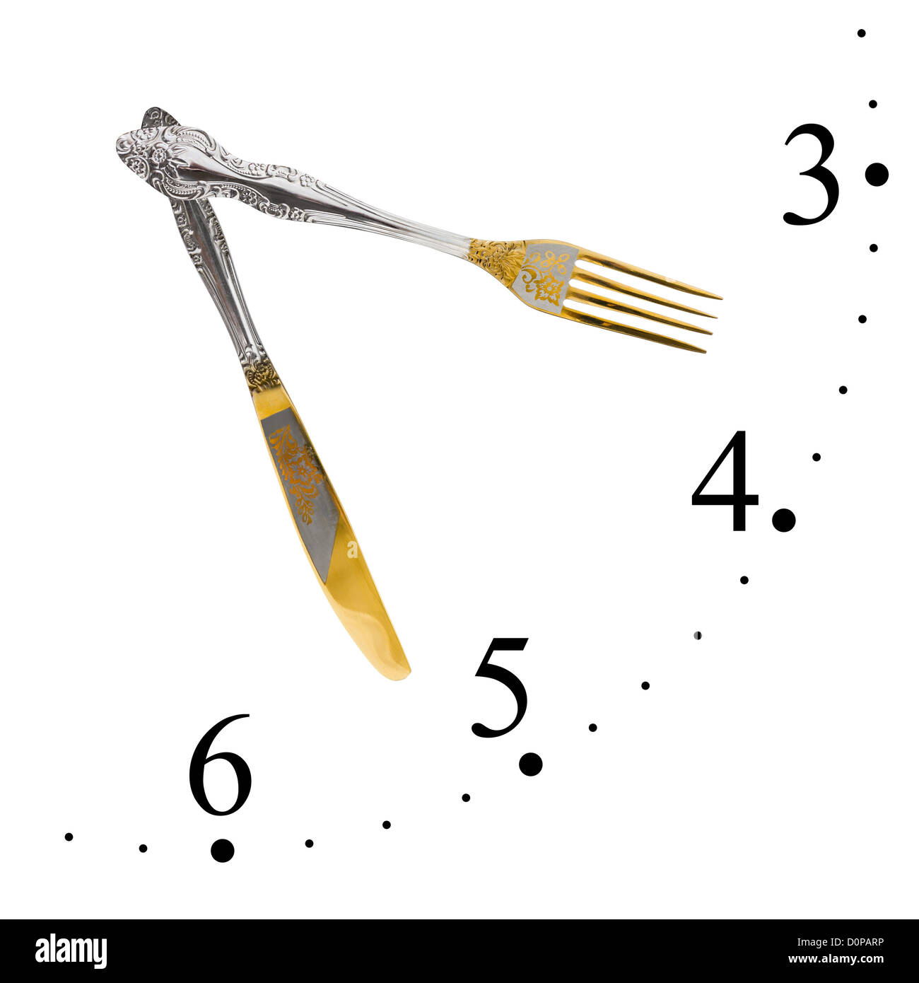 Clock made of fork and knife Stock Photo - Alamy