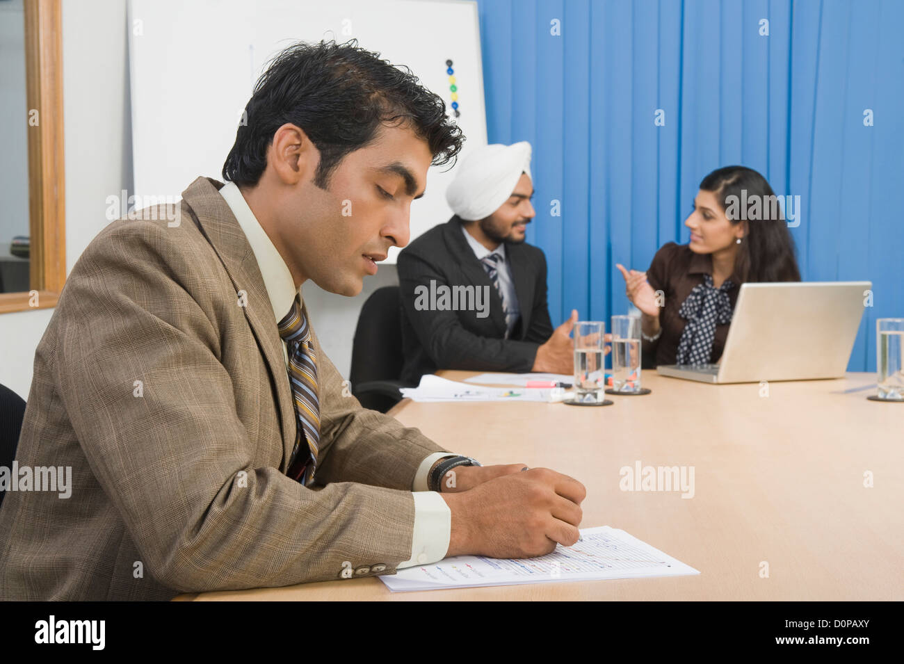 Business executives having a meeting in an office Stock Photo - Alamy