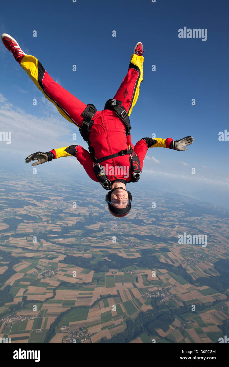 Skydiver flying head down position hi-res stock photography and images ...