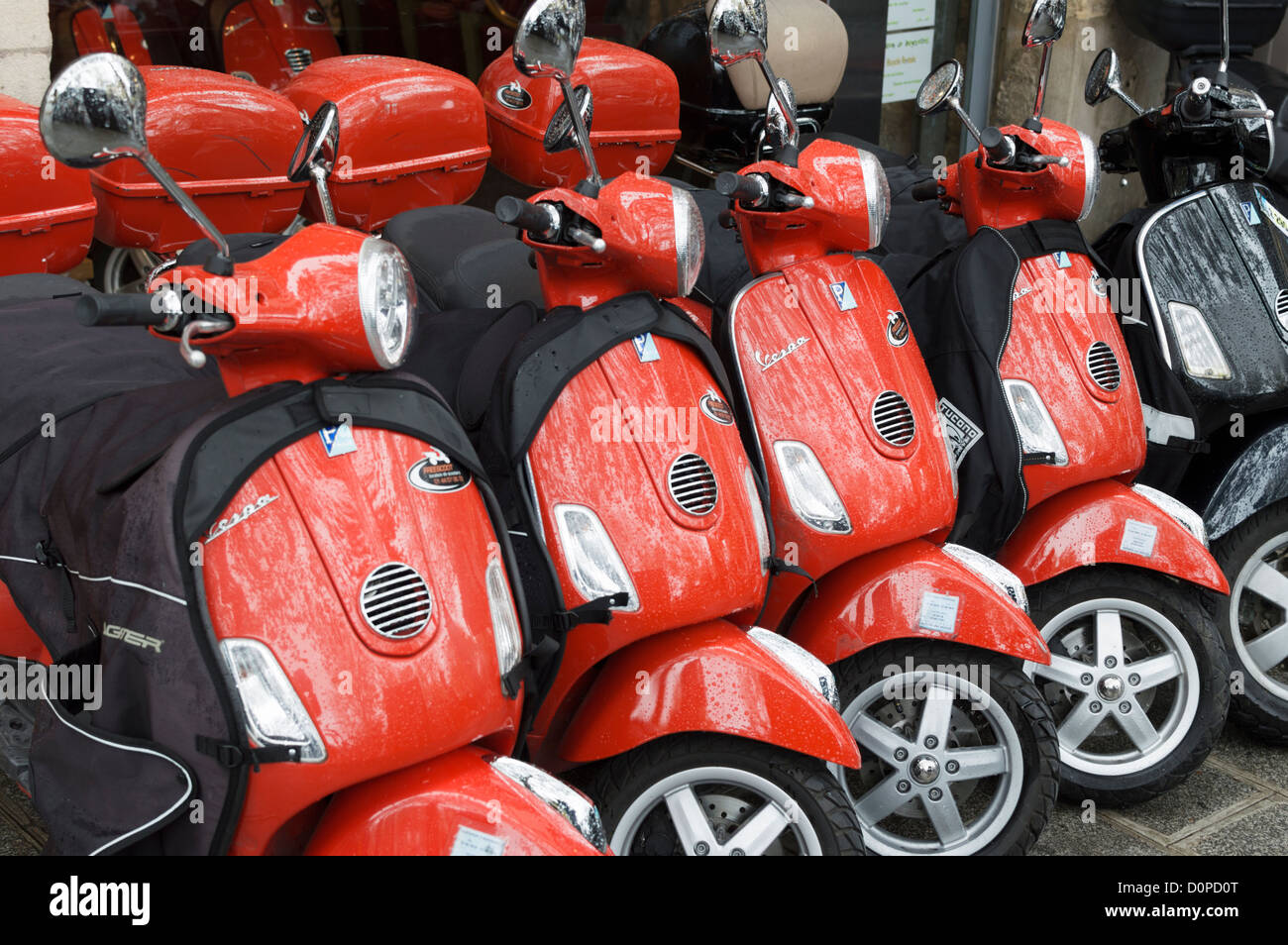 Red motor scooters High Resolution Stock Photography and Images - Alamy