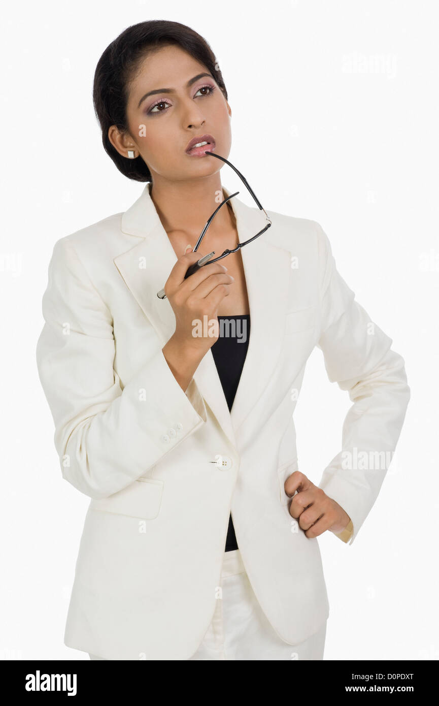 Close-up of a businesswoman thinking Stock Photo - Alamy