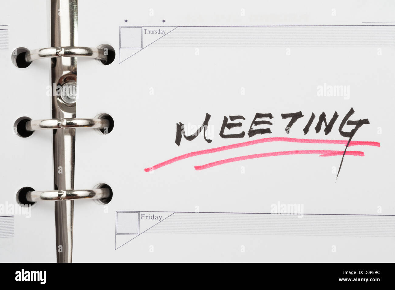Meeting word written on notebook Stock Photo - Alamy