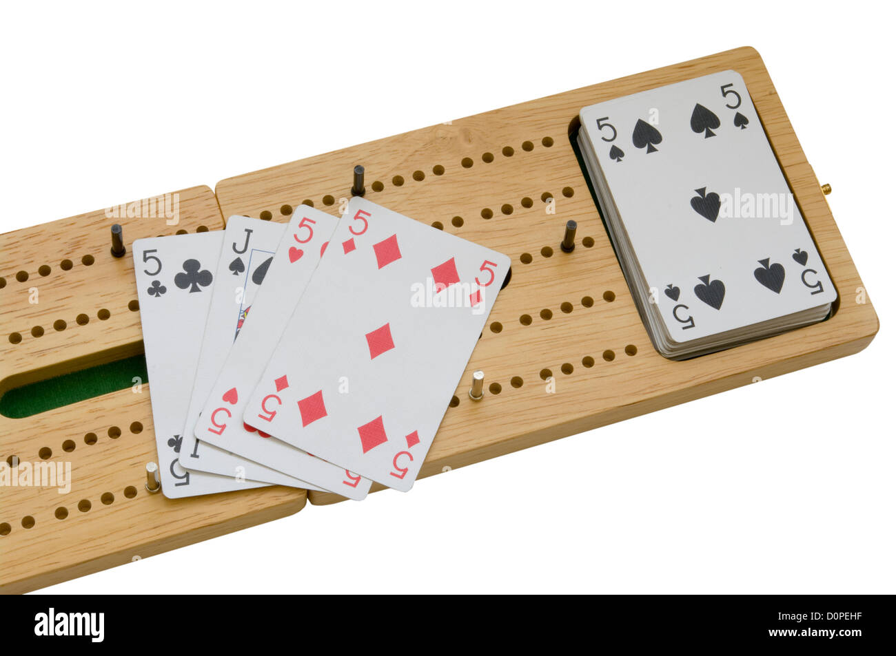 Cribbage Board and Playing Cards against a White Background Stock Photo ...