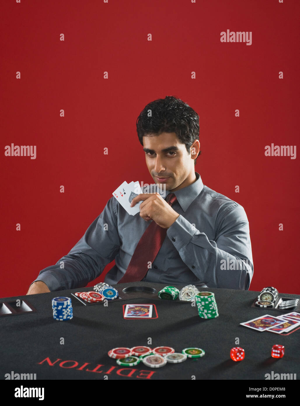 Portrait of a man gambling Stock Photo - Alamy
