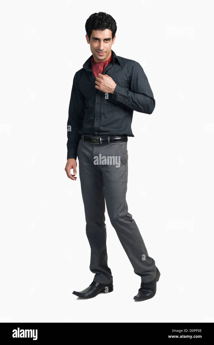 Portrait of a man posing against a white background Stock Photo - Alamy