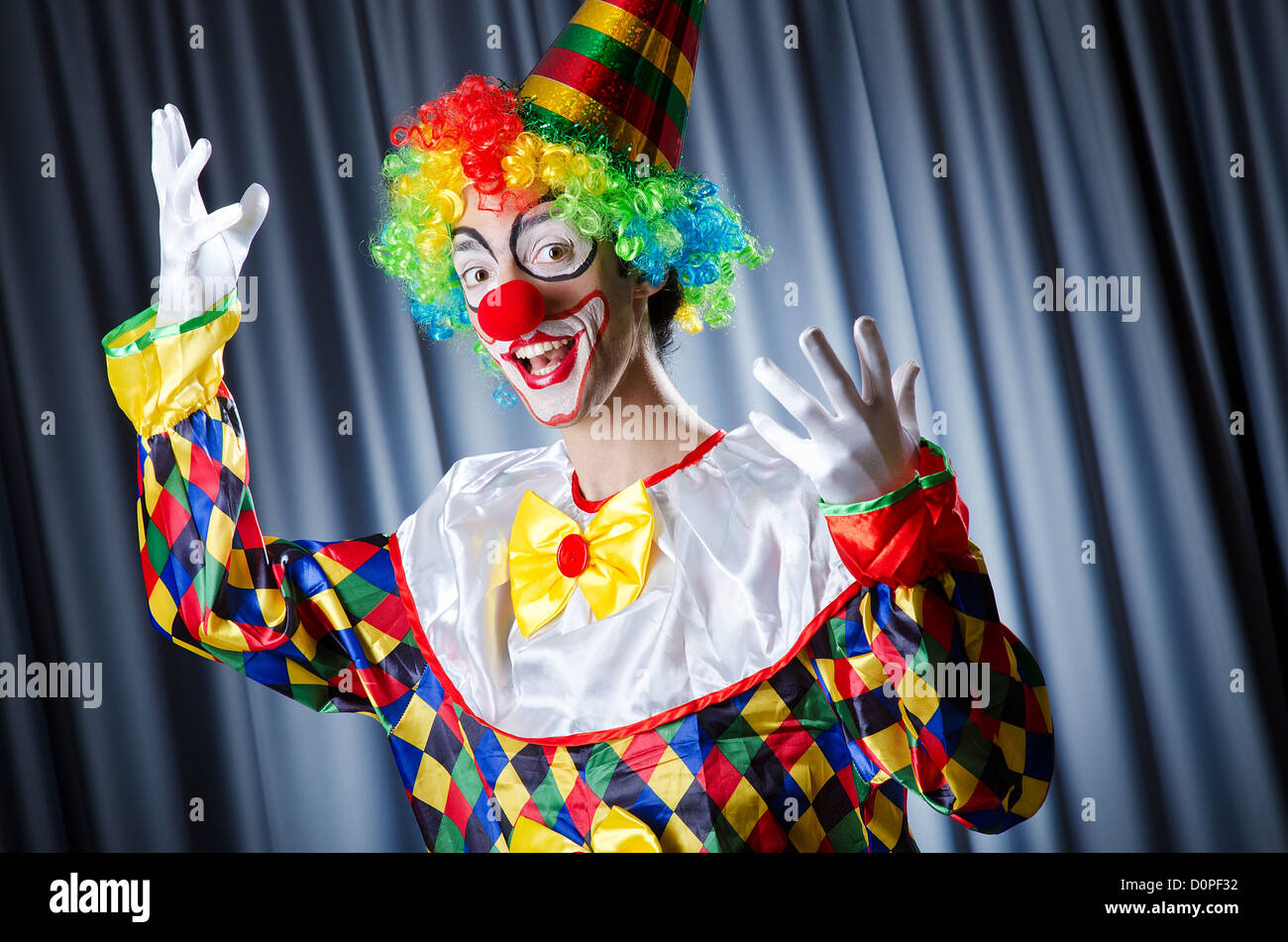 Funny clown in studio shooting Stock Photo - Alamy