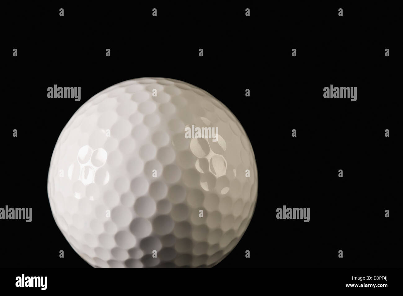 Close-up of a golf ball Stock Photo - Alamy