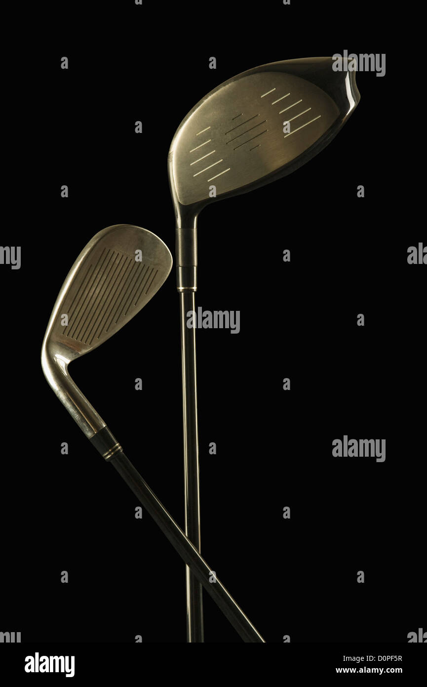 Close-up of two golf clubs Stock Photo - Alamy