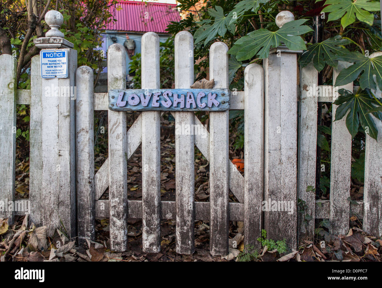 White wooden gate fence loveshack hi-res stock photography and images ...
