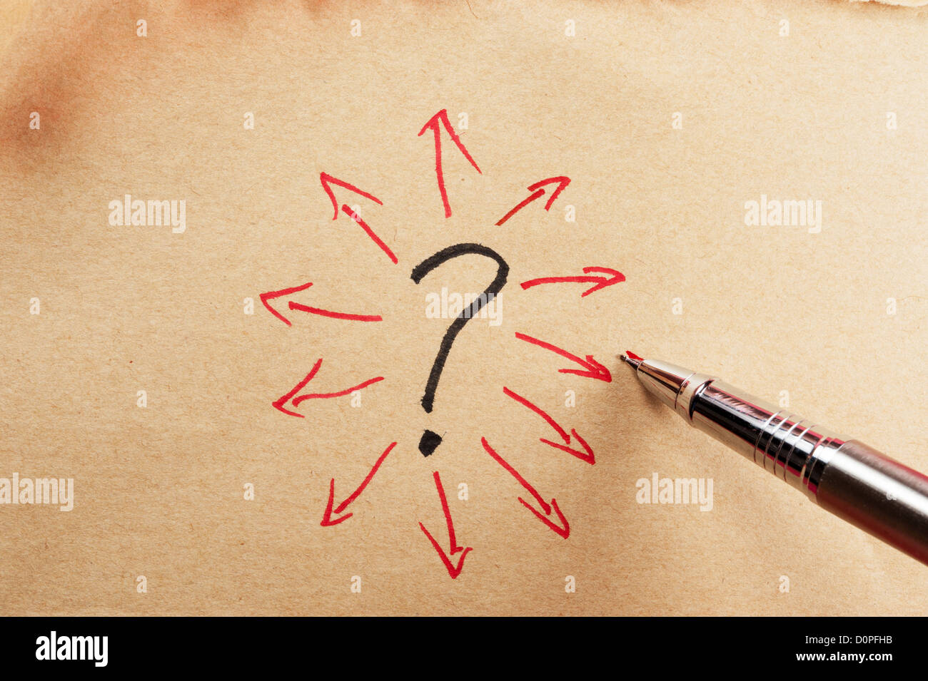 Question mark and group of arrows drawn on paper using a pen Stock ...