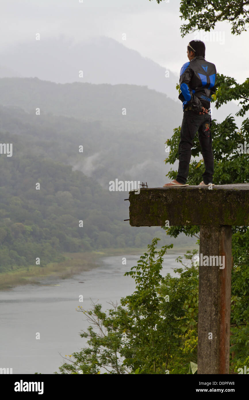 Man looking over the Jungle on Bali, Indonesia Stock Photo - Alamy