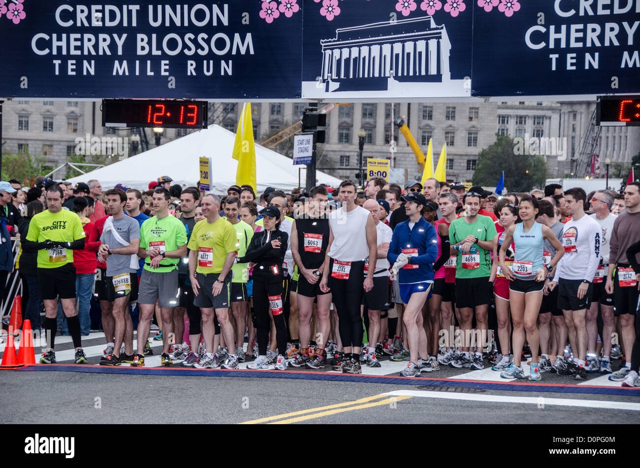 Runners in the Red Wave get ready at the start of the 2012 Cherry ...