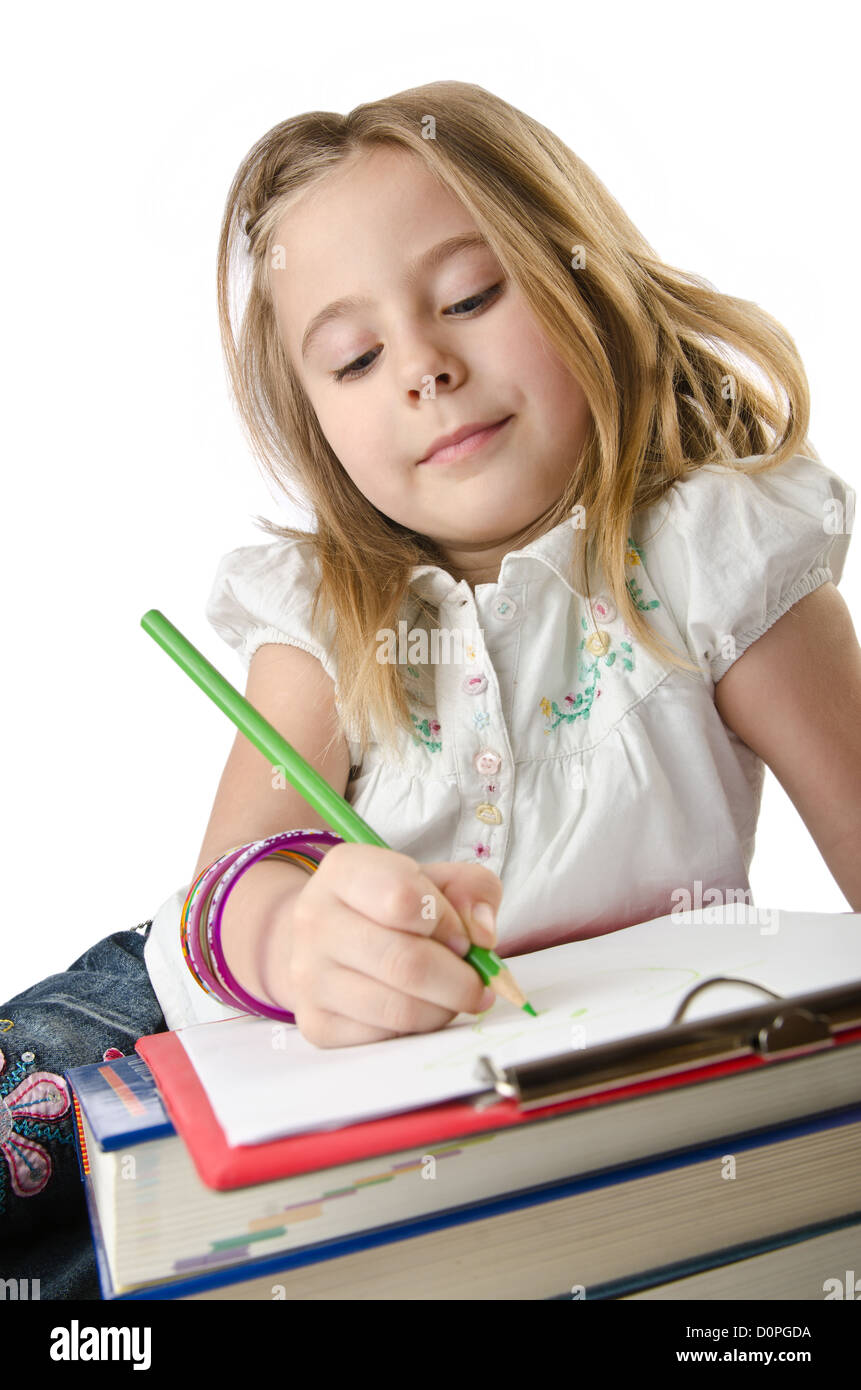 Little girl writing with pencils Stock Photo - Alamy