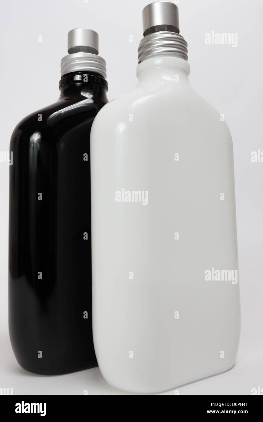 two bottle of parfum and spray on white background Stock Photo - Alamy