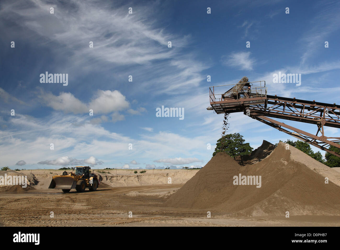Stock pile of aggregate gravel and sand at an open cast gravel bed ...