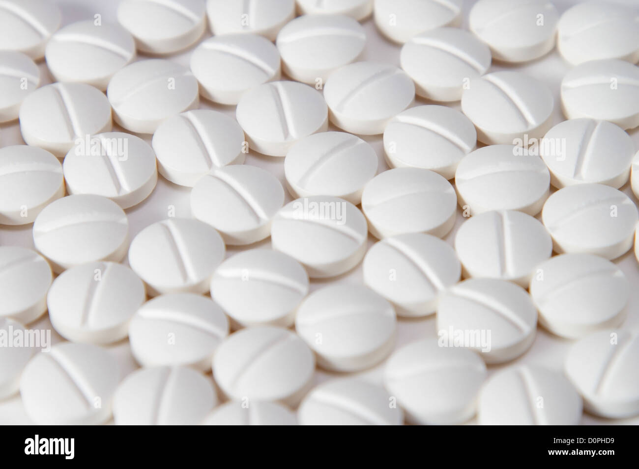 round pills paracetamol or aspirin painkiller remedy Stock Photo - Alamy