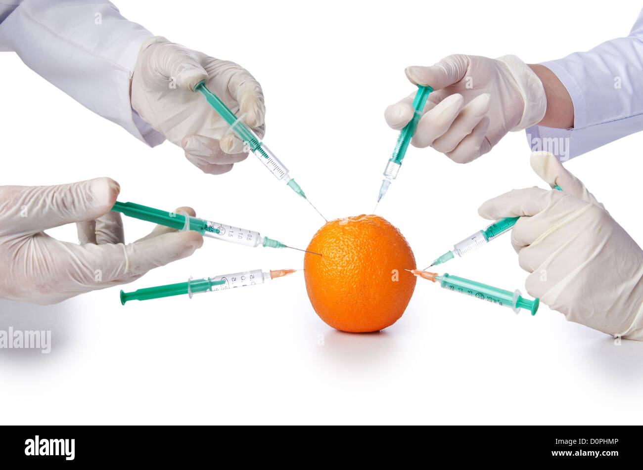 Science experiment with orange and syringe Stock Photo - Alamy