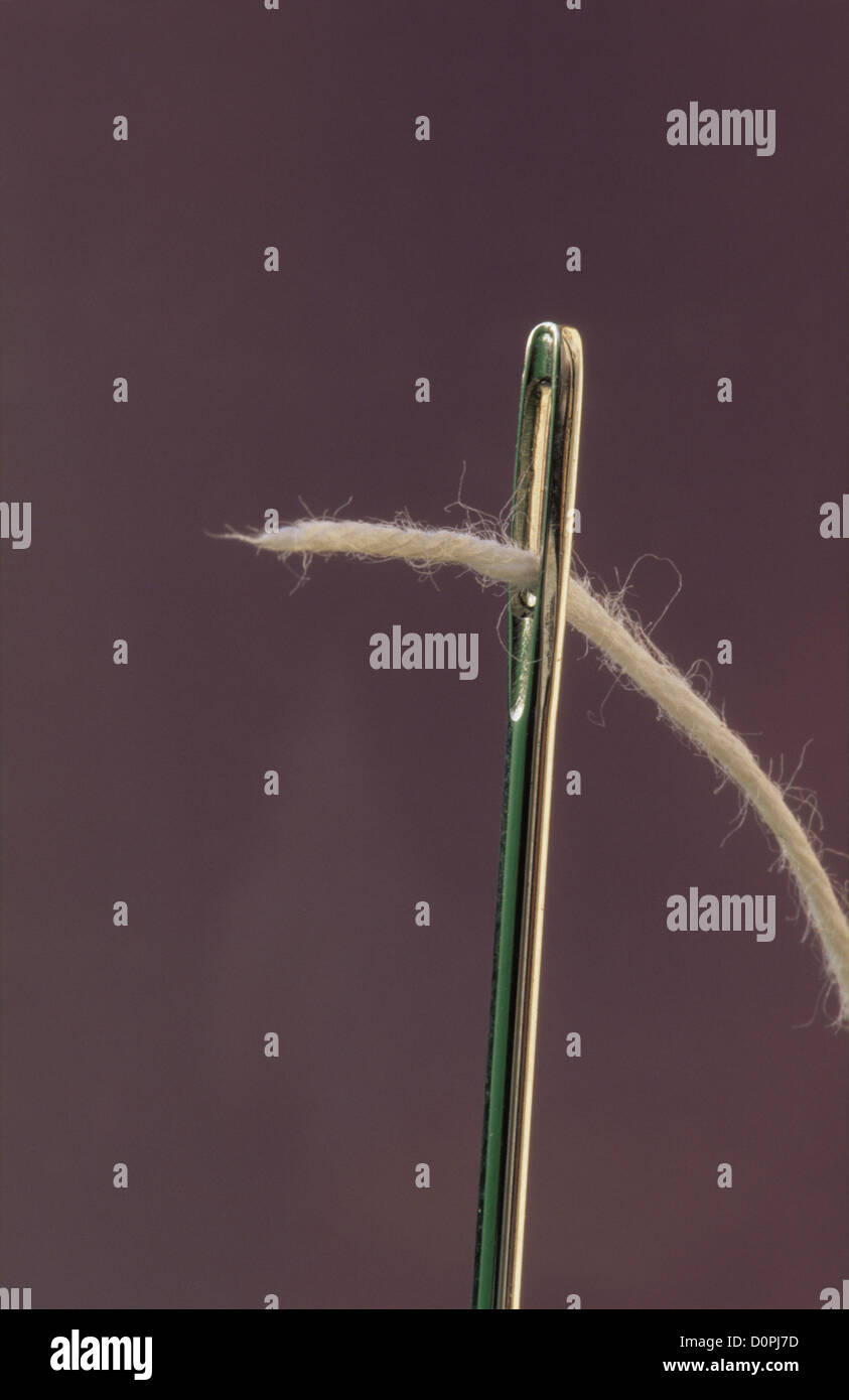 Needle and thread Stock Photo - Alamy
