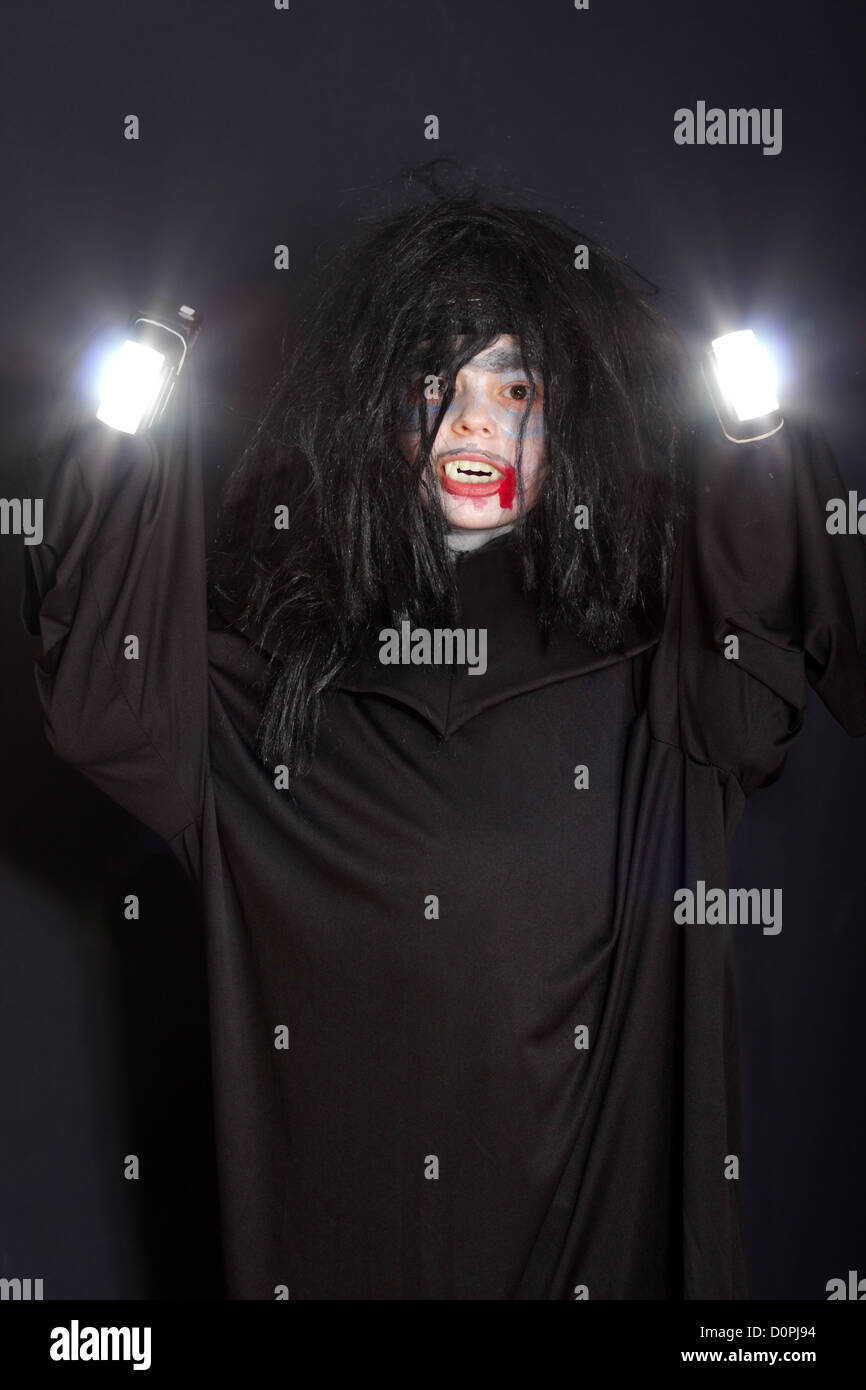 Vampire with light Stock Photo - Alamy