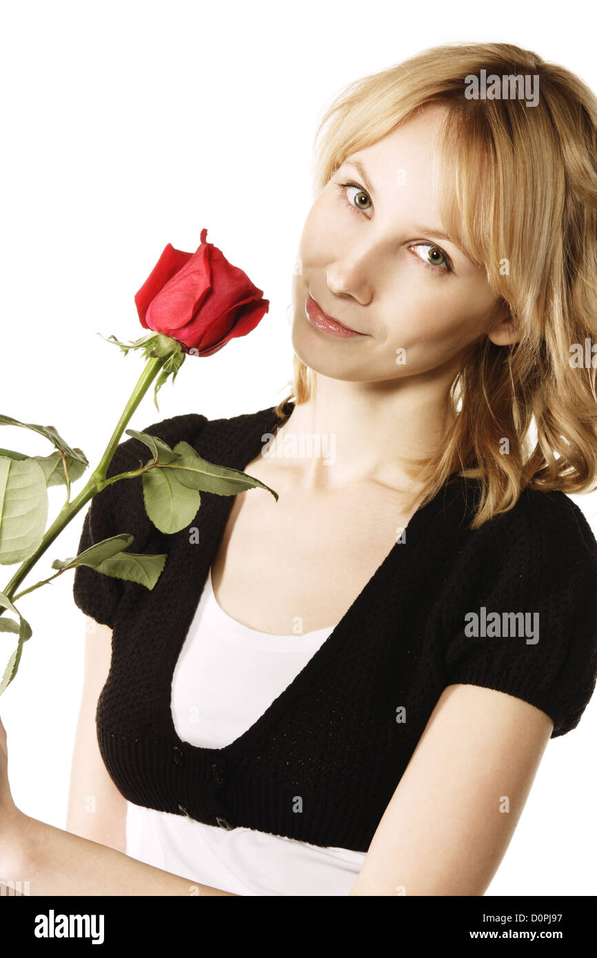 Pretty blonde with rose flower Stock Photo - Alamy