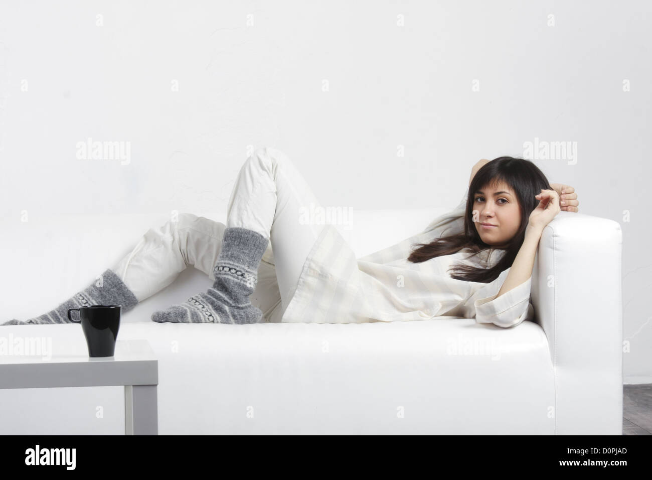 Pretty brunette girl laying down hi-res stock photography and images ...
