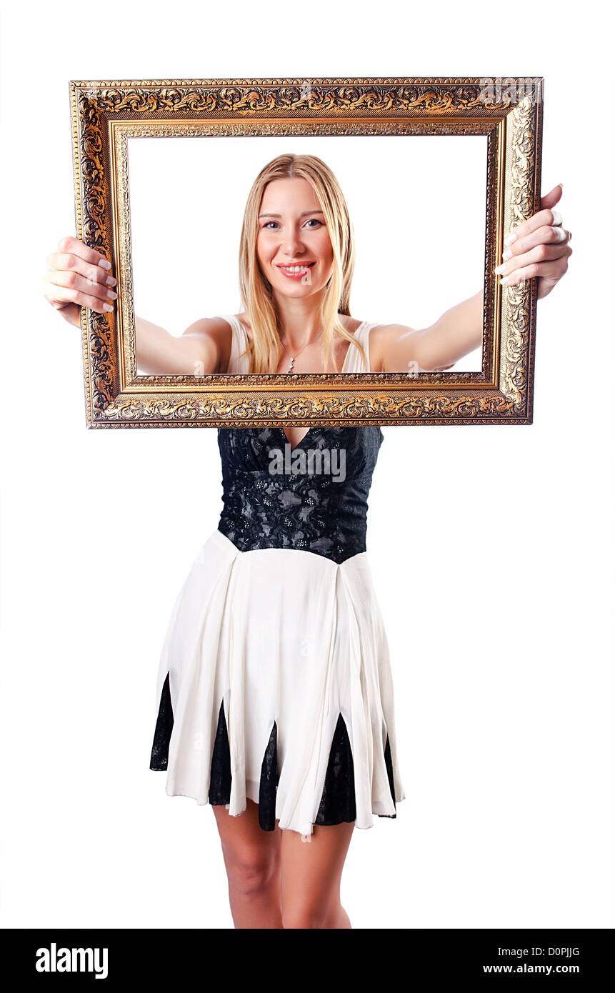Young woman with picture frame on white Stock Photo - Alamy