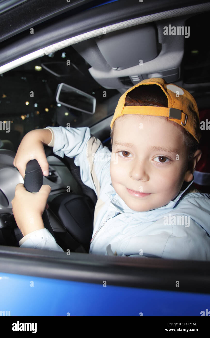 Boy in car Stock Photo - Alamy