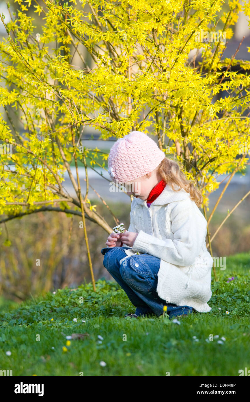 small girl in spring park Stock Photo - Alamy