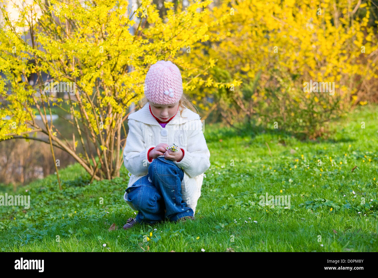 small girl in spring park Stock Photo - Alamy