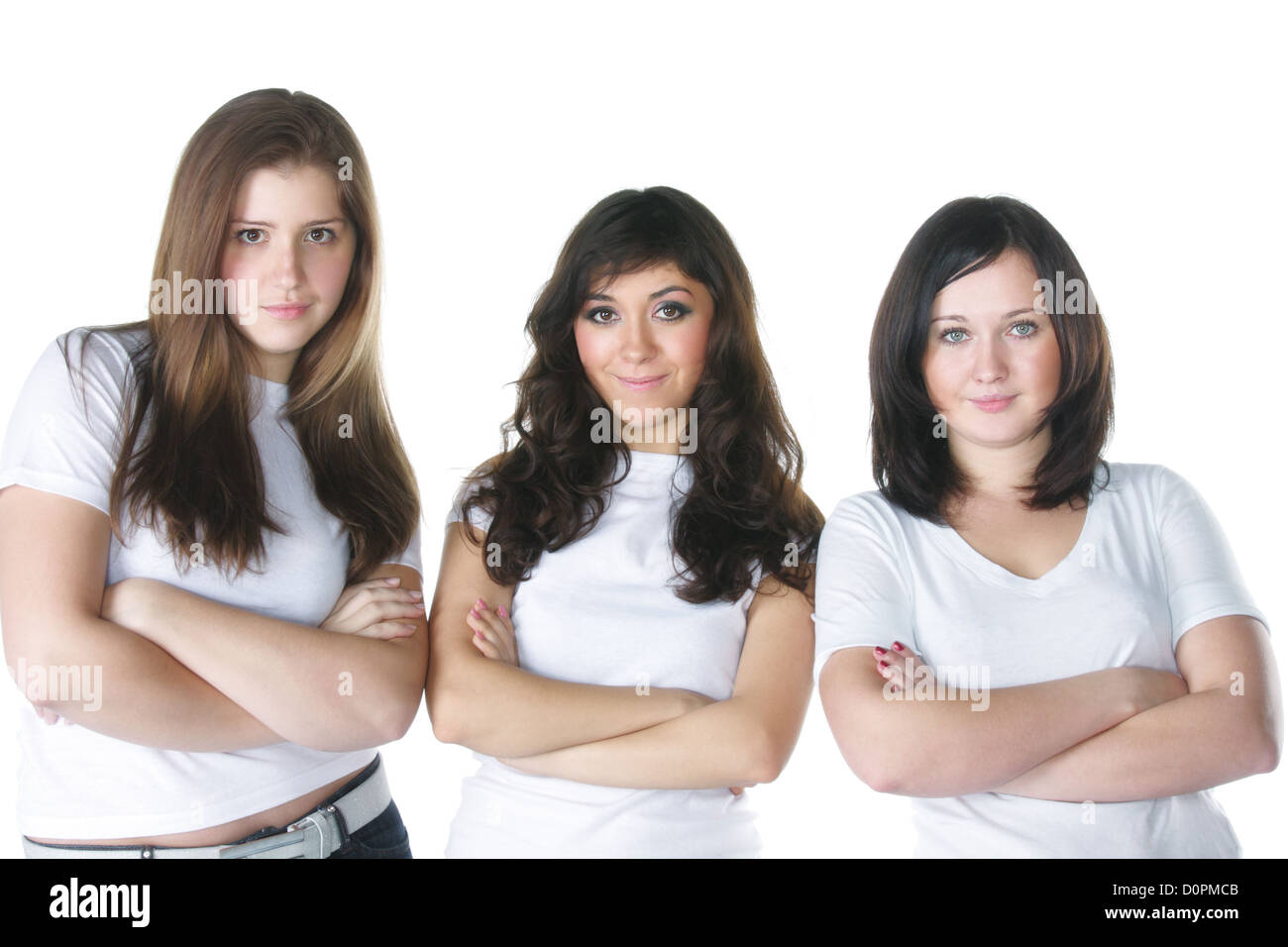 Three women arms folded Stock Photo - Alamy