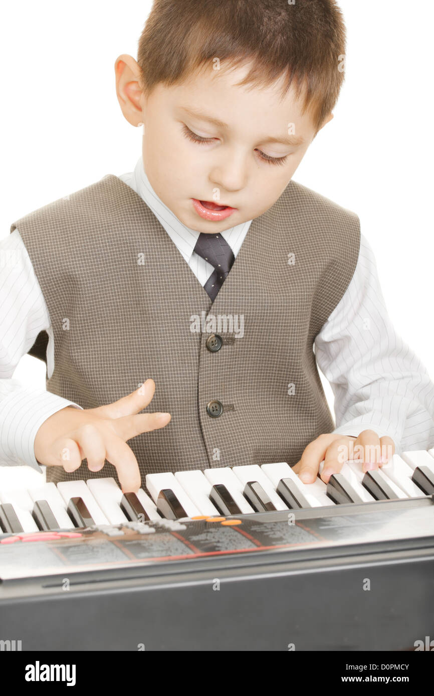 Child black piano boy hi-res stock photography and images - Alamy