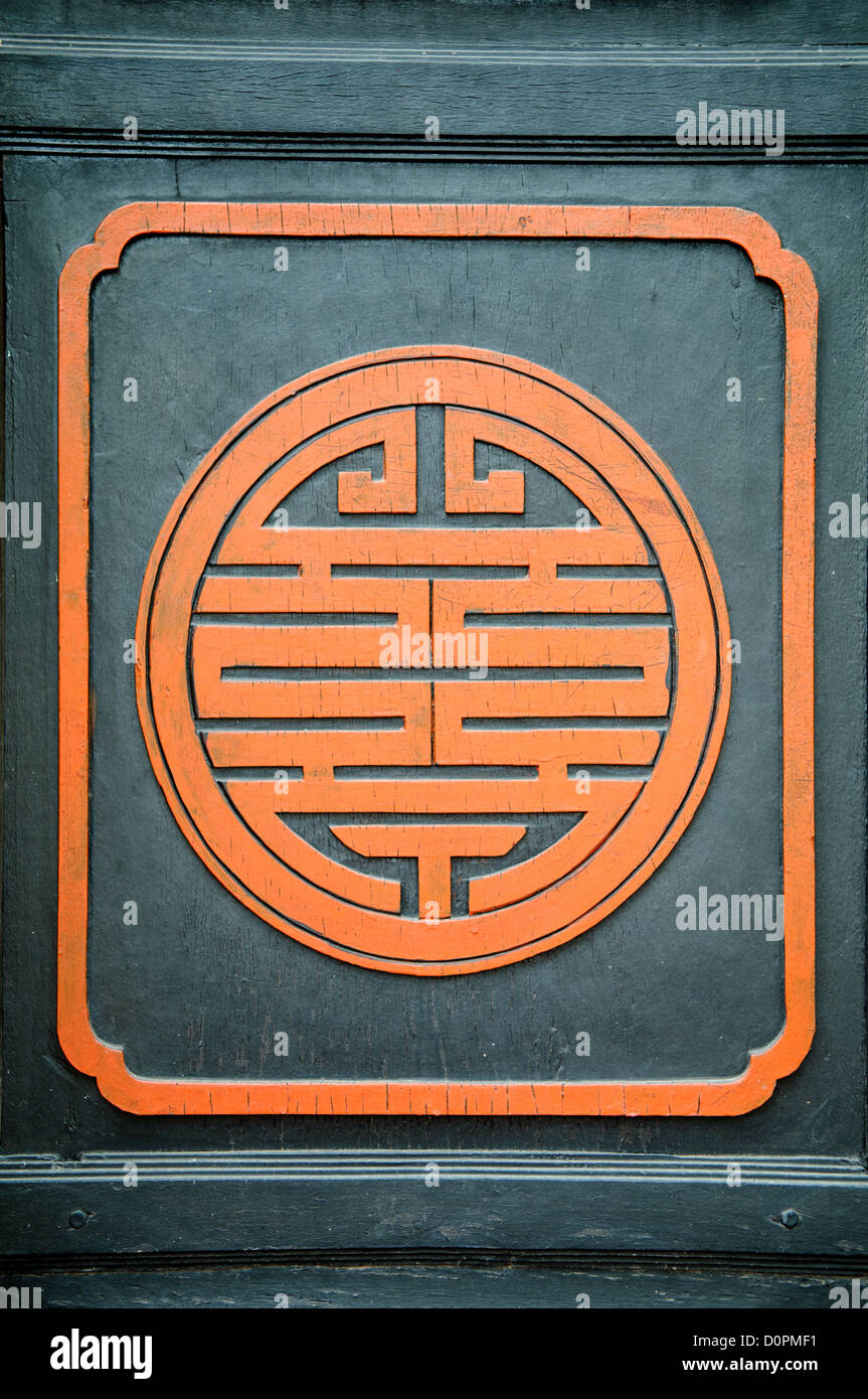 HANOI, Vietnam — The sharp lines of a pattern decorating a gate to the ...