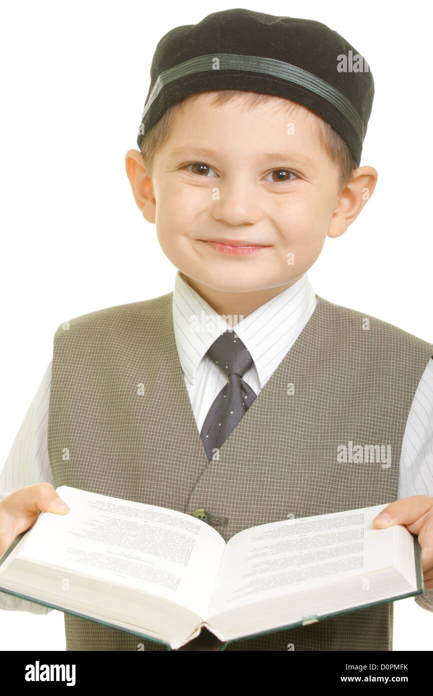 Smiling boy with open book Stock Photo - Alamy