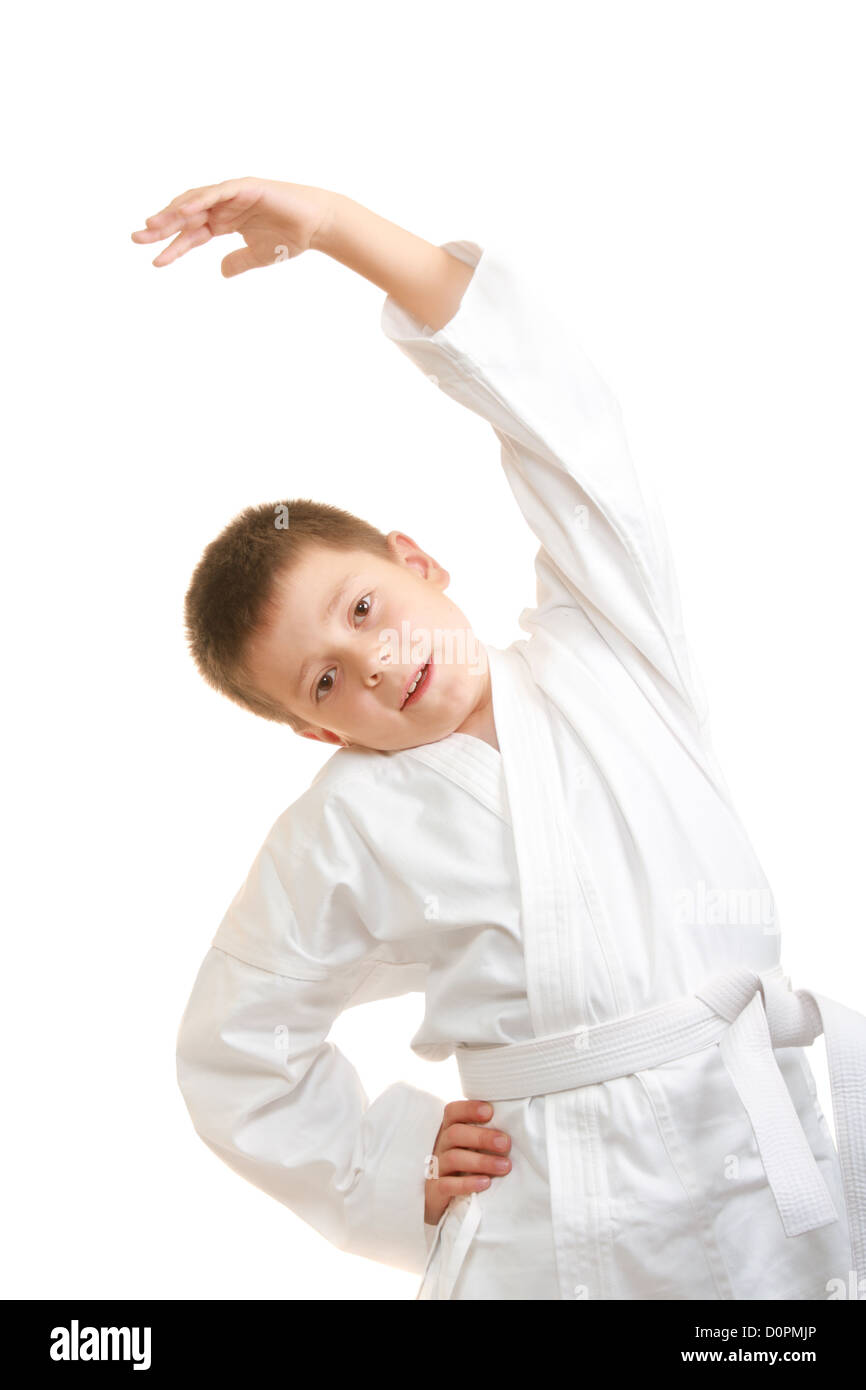 Karate boy inclining right Stock Photo - Alamy