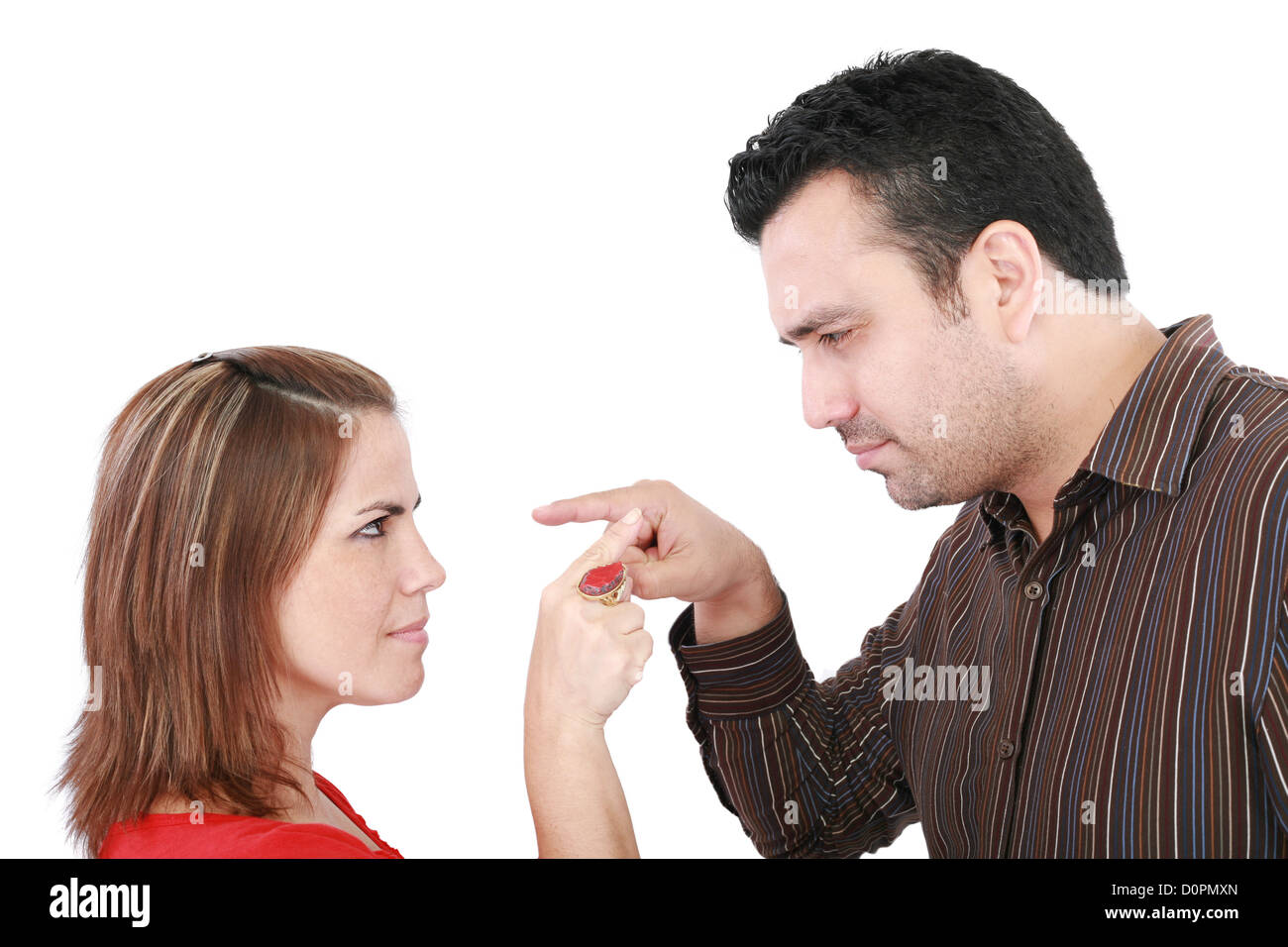 Young couple pointing at each other against a white background Stock ...