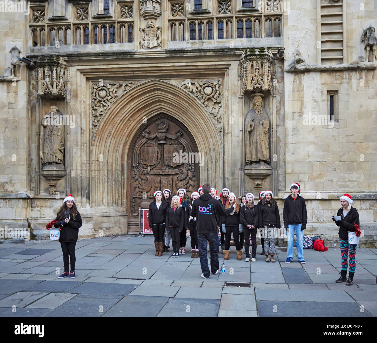 Bath Bath dance college Christmas choir outside Bath Abbey during ...