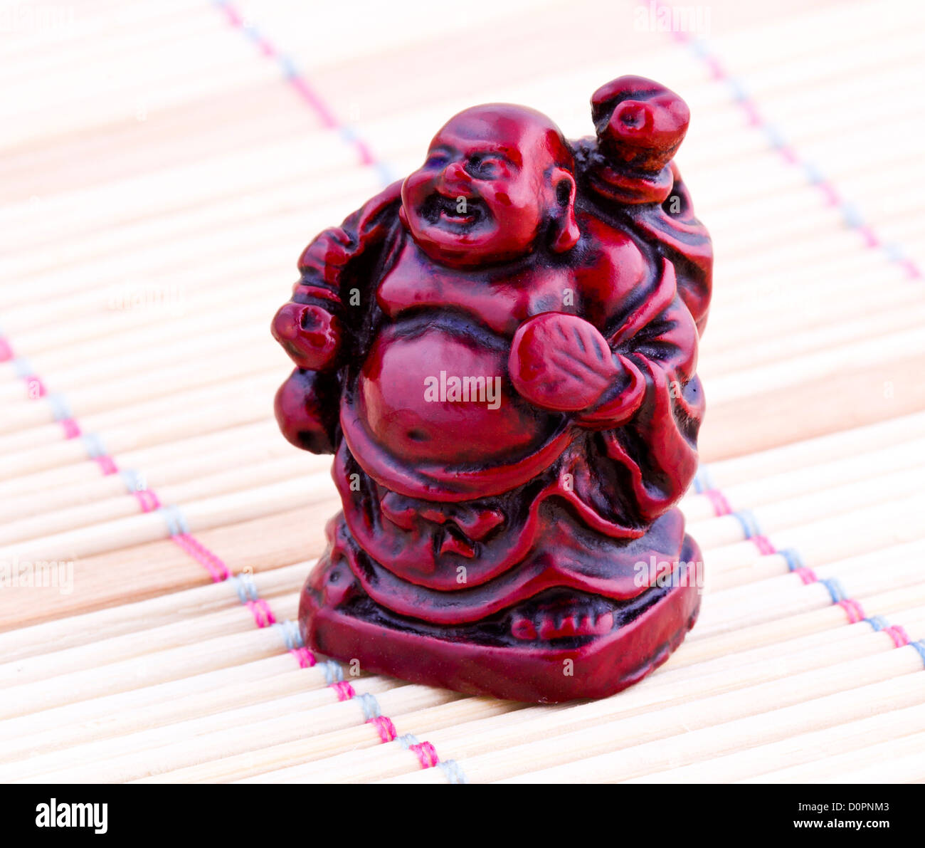 Netsuke red figure. Vintage statue. Close up Stock Photo - Alamy