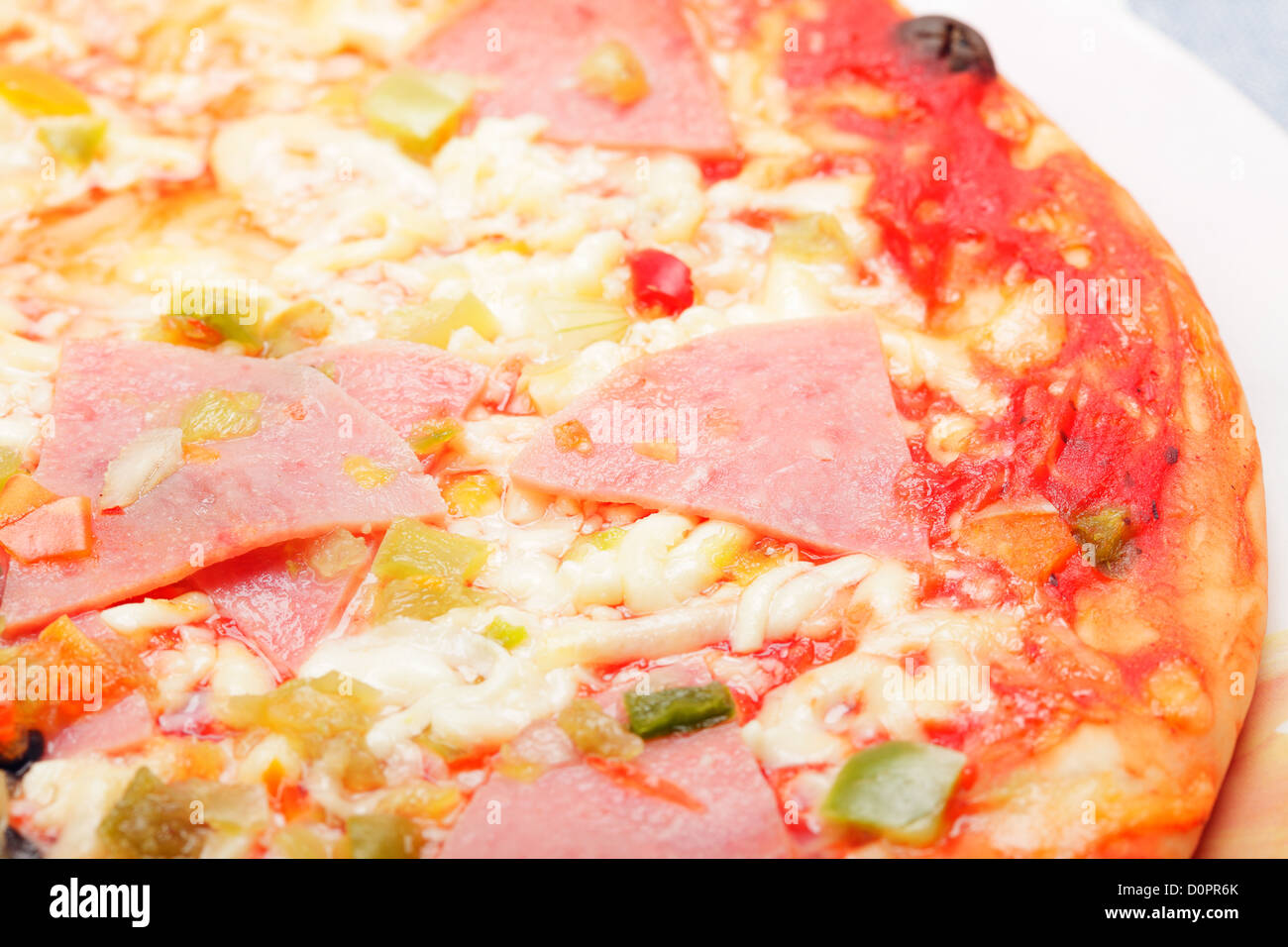 Pizza with ham Stock Photo - Alamy