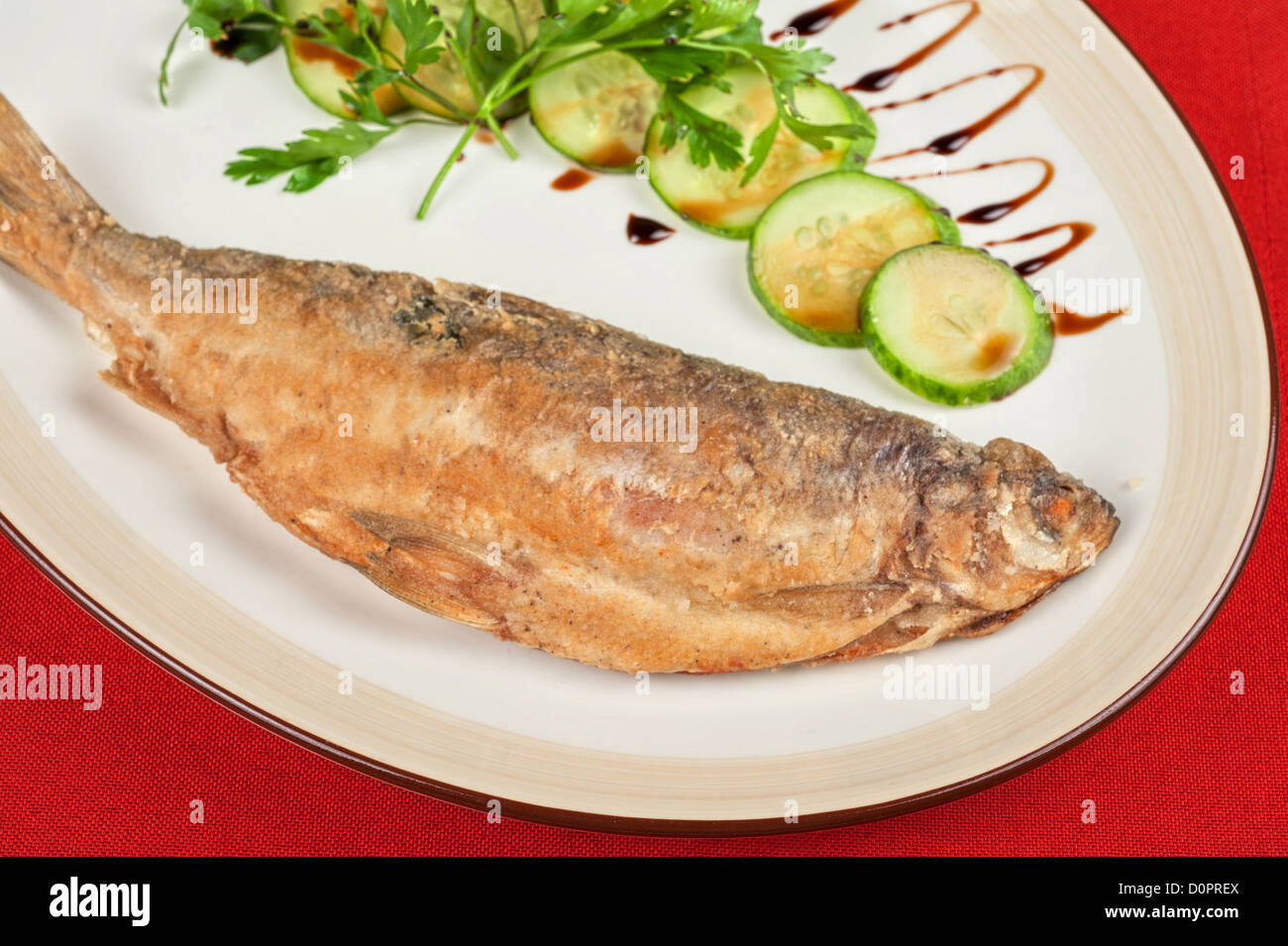 Fried peled fish Stock Photo - Alamy