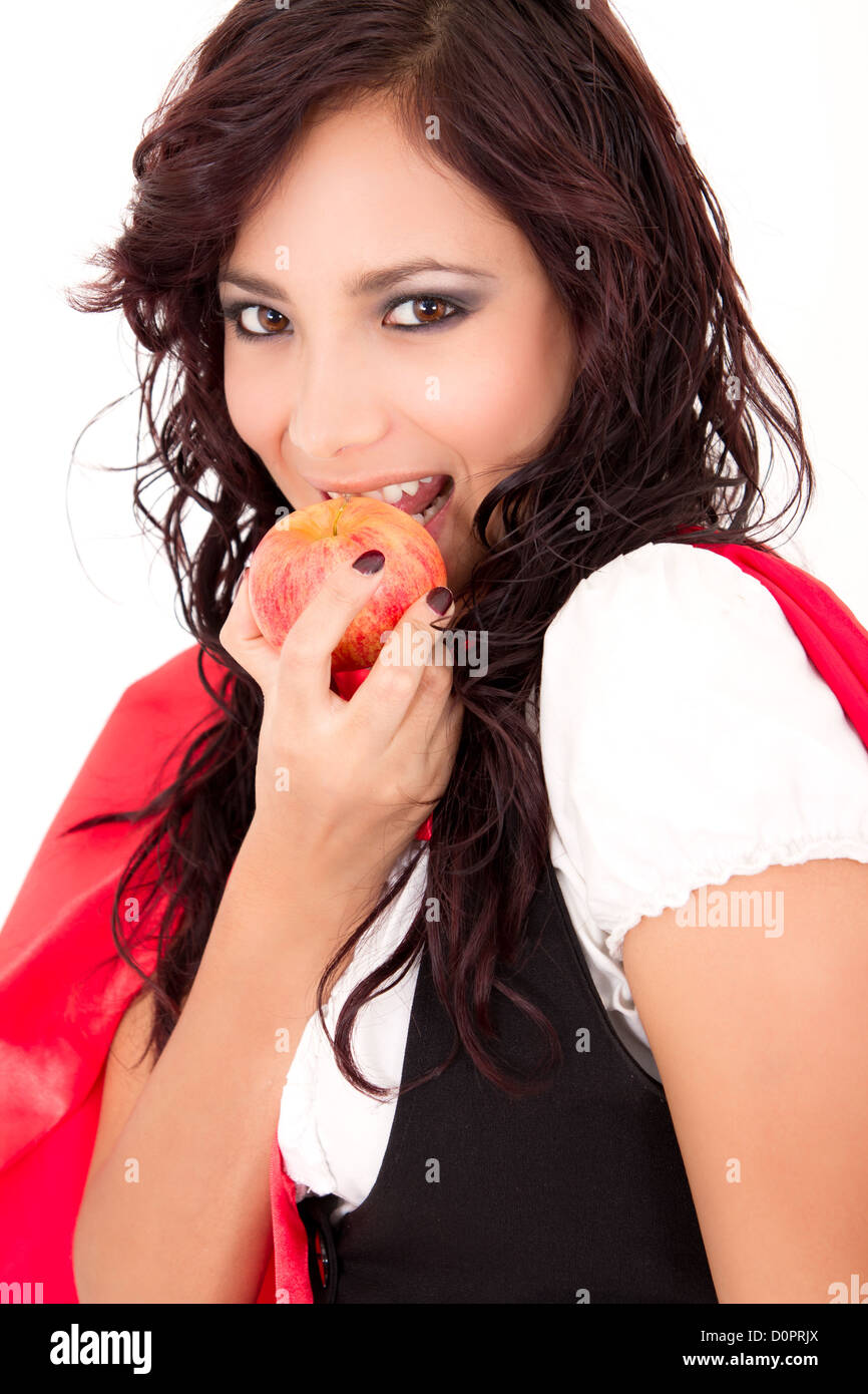 Little Red Riding Hood eating an apple Stock Photo - Alamy