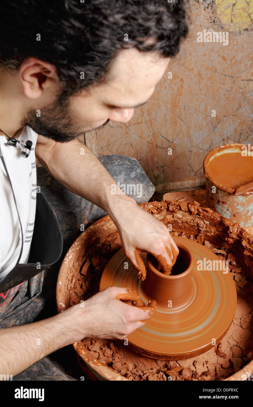 Potter at work above view Stock Photo - Alamy