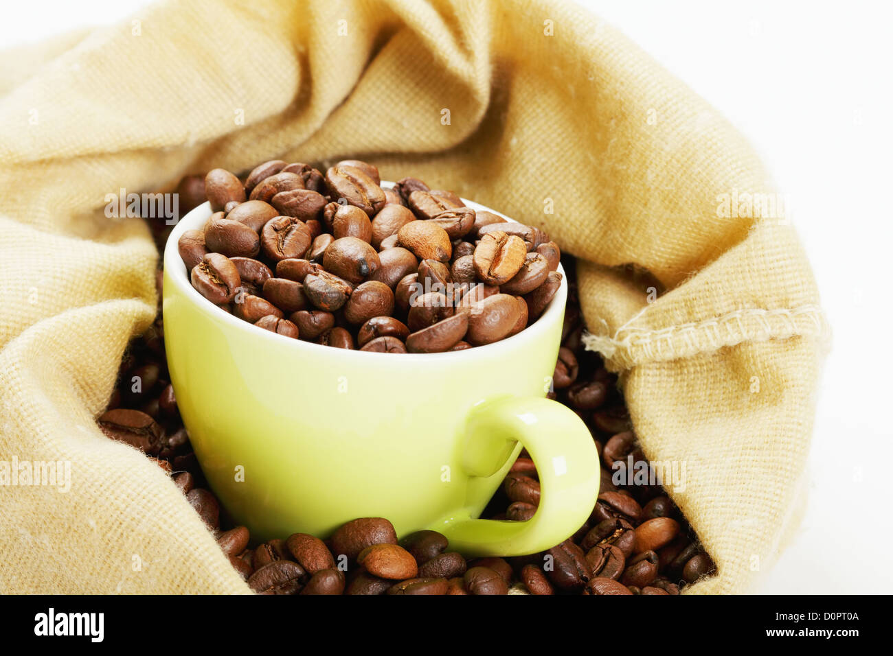 Roasted coffee in textile bag and cup Stock Photo - Alamy