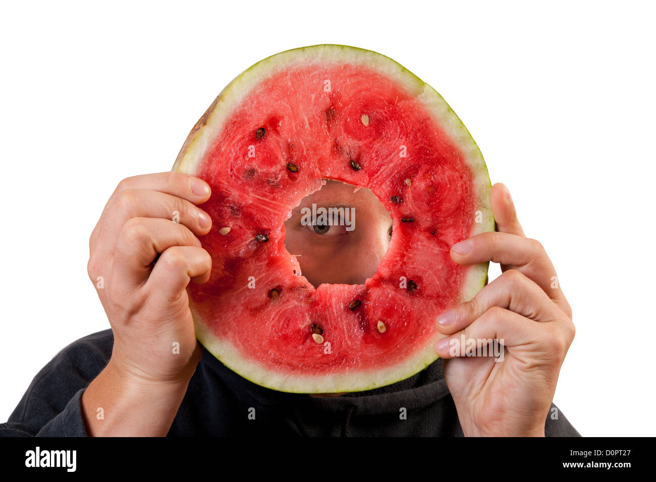 Eye looking through watermelon slice Stock Photo - Alamy