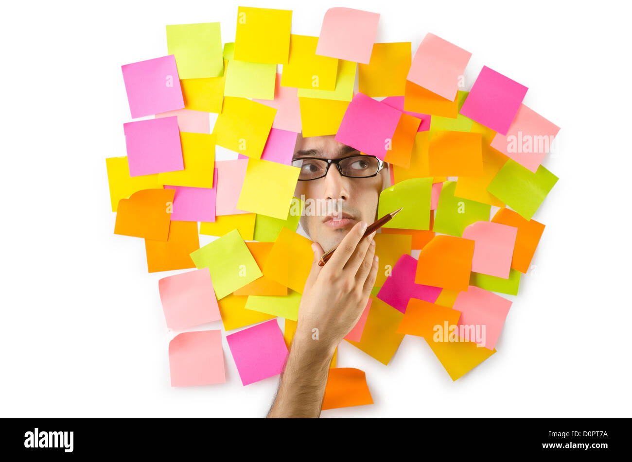 Man's face through paper and reminders Stock Photo - Alamy