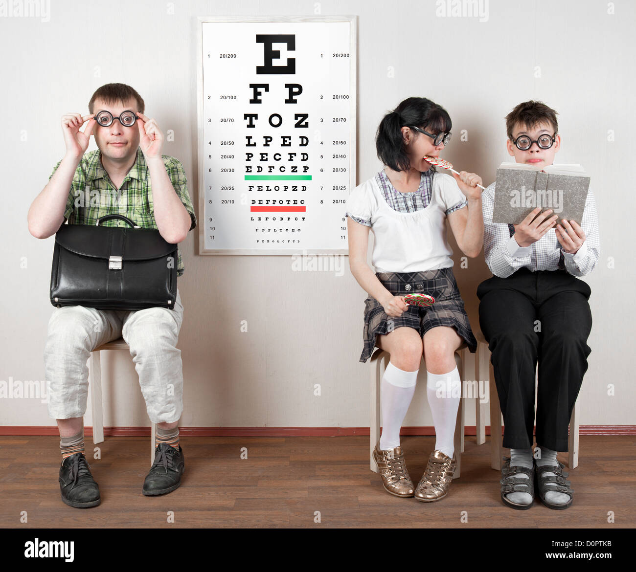 three person wearing spectacles in an office at the doctor Stock Photo ...