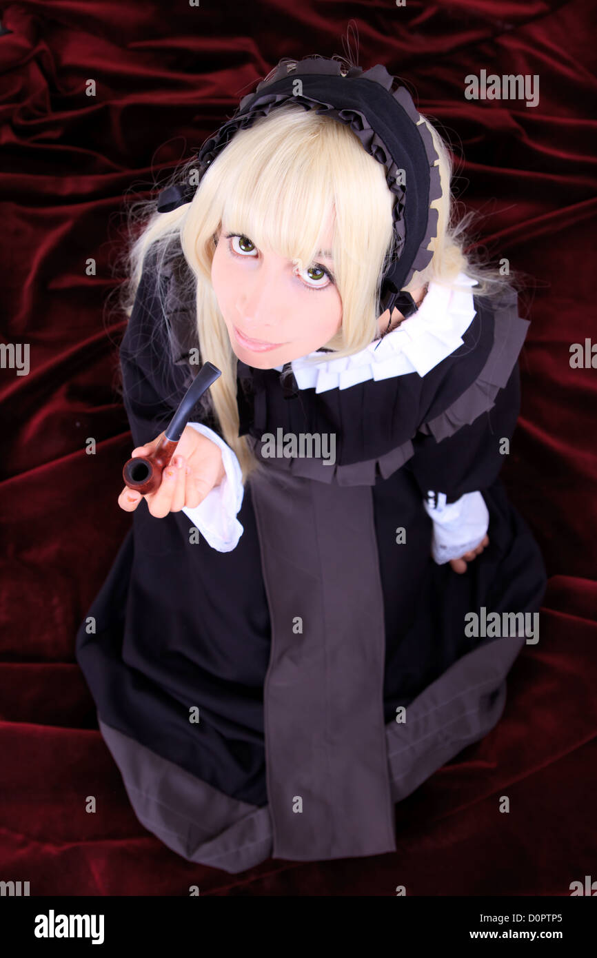 Beautiful cosplay young woman in a costume Stock Photo - Alamy