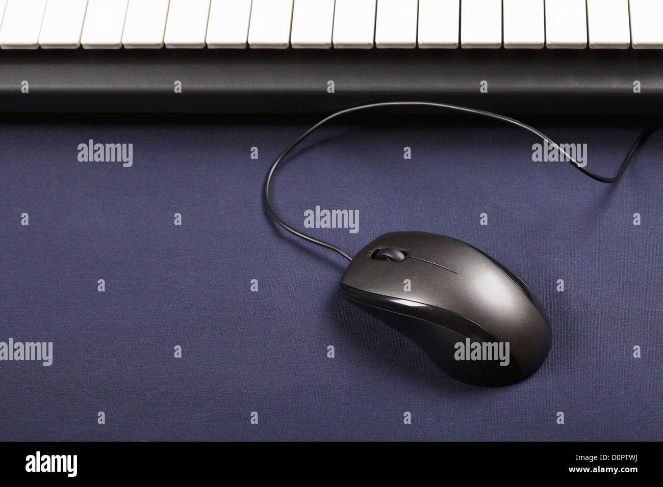 Mouse and piano keyboard Stock Photo - Alamy