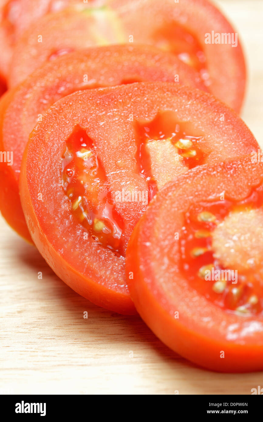 Tomato slices closeup Stock Photo - Alamy